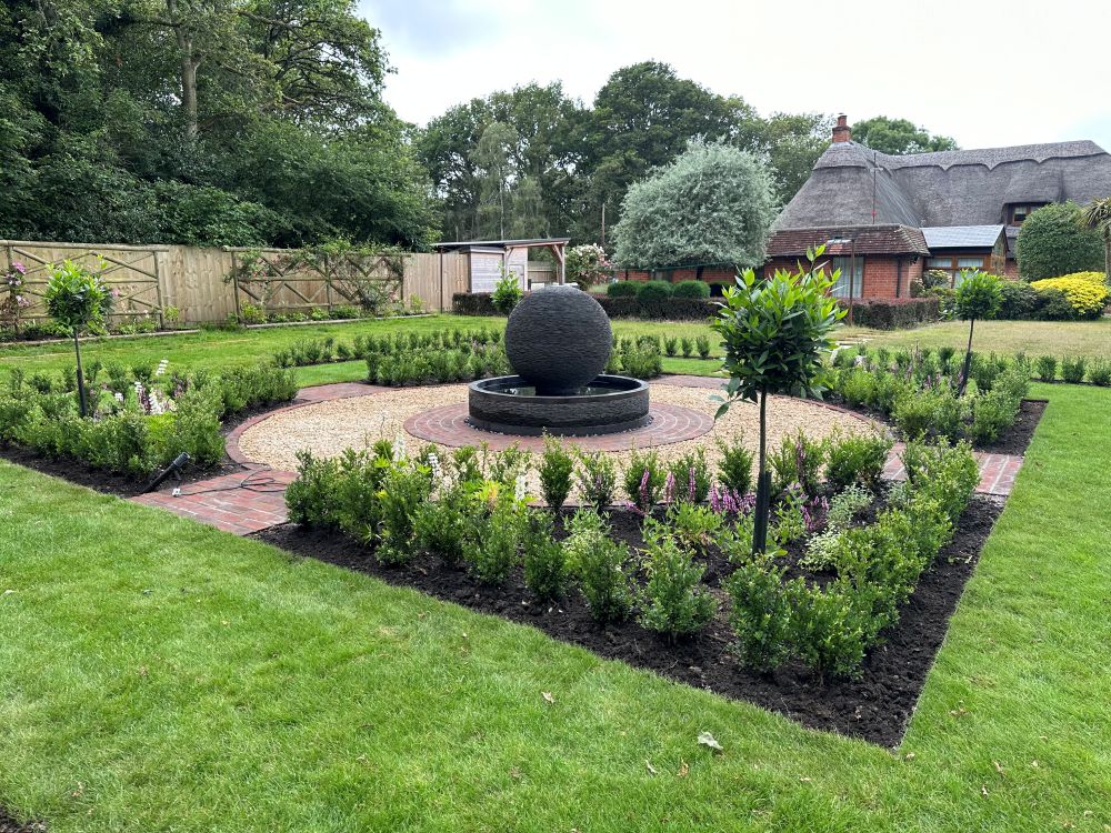 Traditional Topiary Transforms a Large Garden in Crookham - ALDA Landscapes